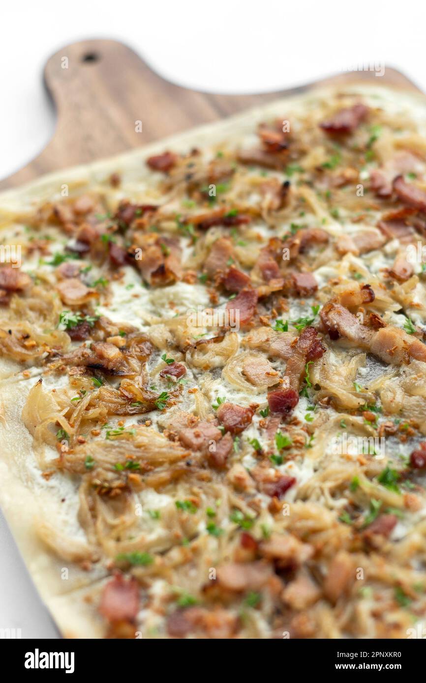 Flammkuchen tarte flambee rectangular pizza with bacon and chicken on ...
