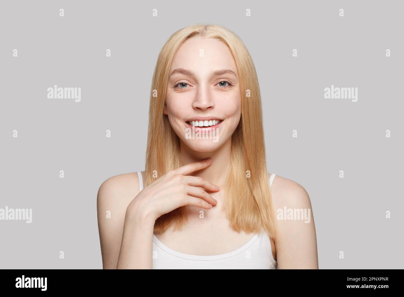 Female model face. Beautiful blonde woman looking at camera Stock Photo ...