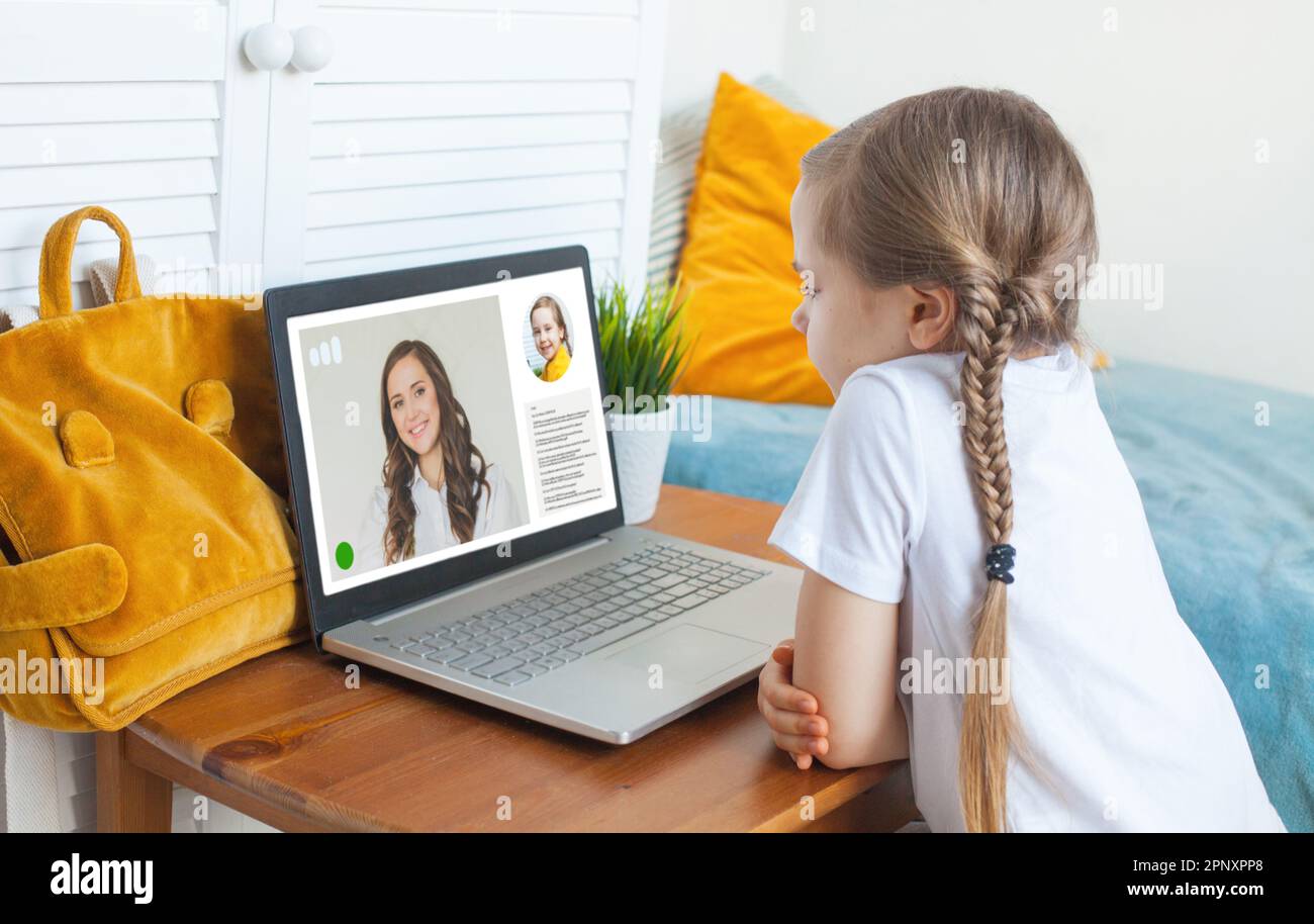 Serious young girl learning at home. Elearning concept Stock Photo - Alamy