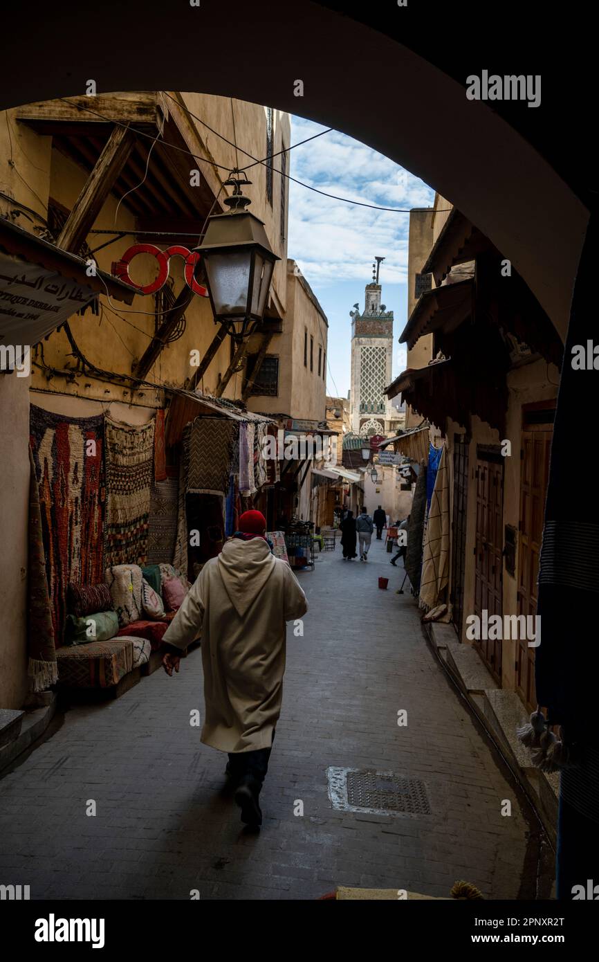 Man walking fez fes medina hi-res stock photography and images - Alamy