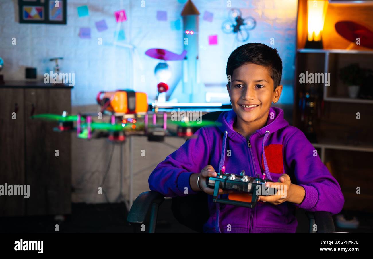 Excited indian kid celebrating after successfully test flying small ...