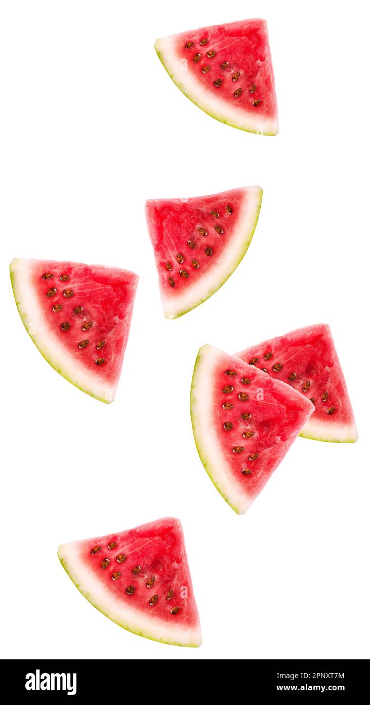 Isolated flying watermelon slices. Watermelon fruit pieces on the air ...