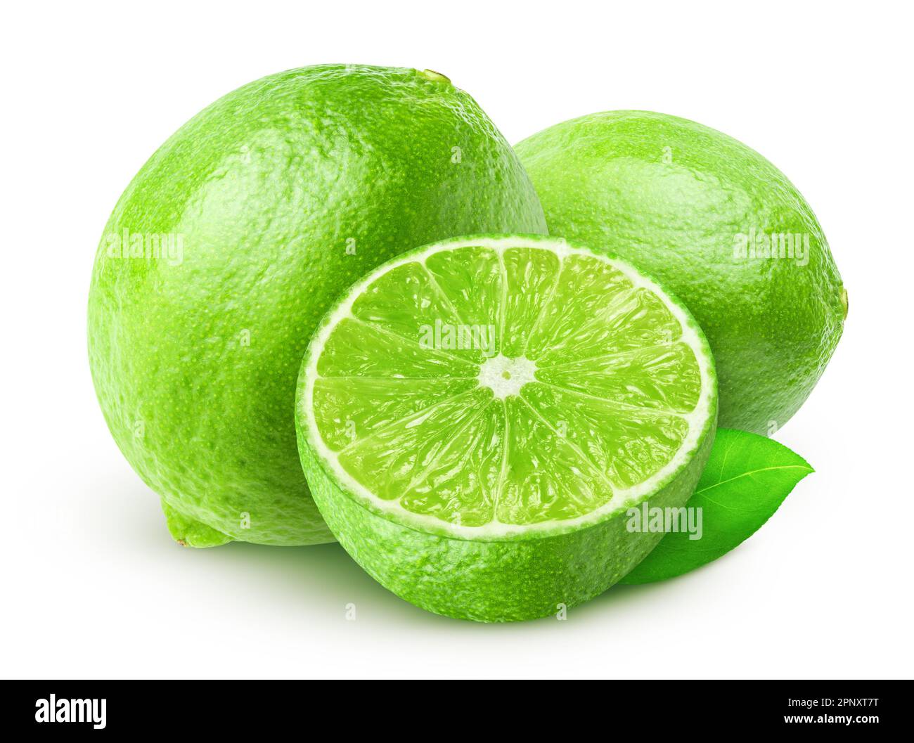Isolated limes. Two whole lime fruit and half with leaf isolated on ...
