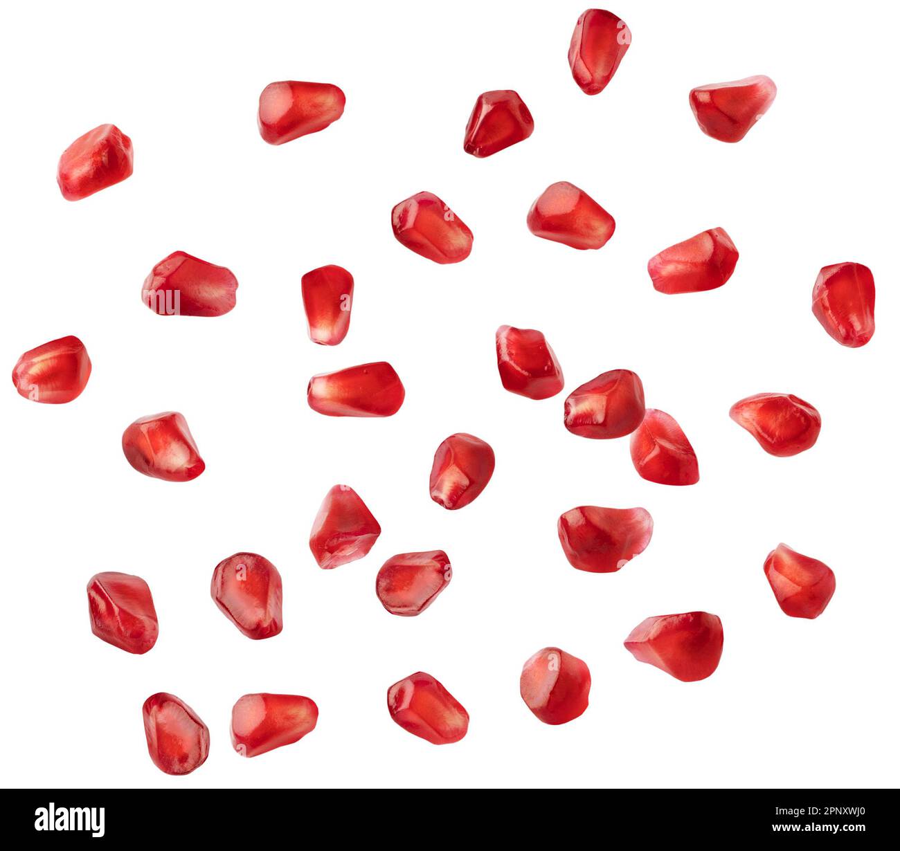 Falling pomegranate seeds. Collection of flying pomegranate fruit seeds ...