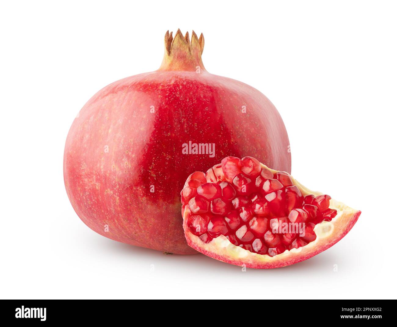 Isolated pomegranate. Whole pomegranate fruit with a piece isolated on ...