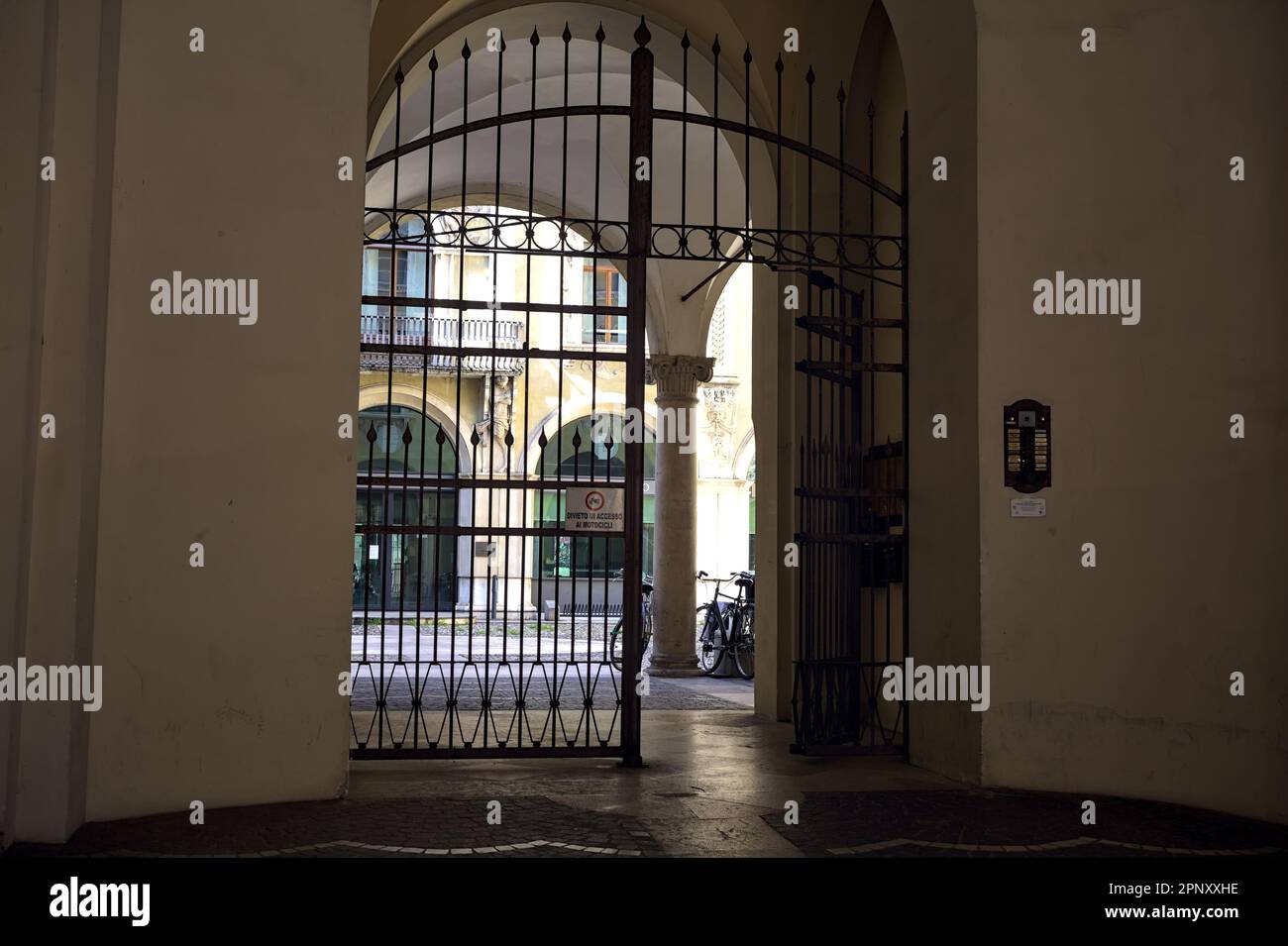 Entrance to an historic building with an inner yard at the end of it in ...