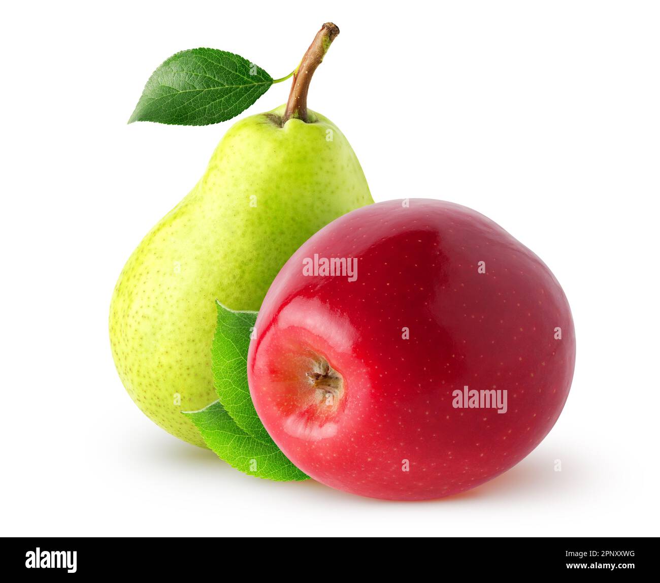 Isolated fruits. Whole yellow pear and red apple with leaves isolated ...