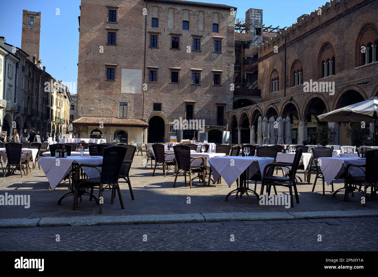 Square with people strolling in an italian town on a sunny day Stock ...