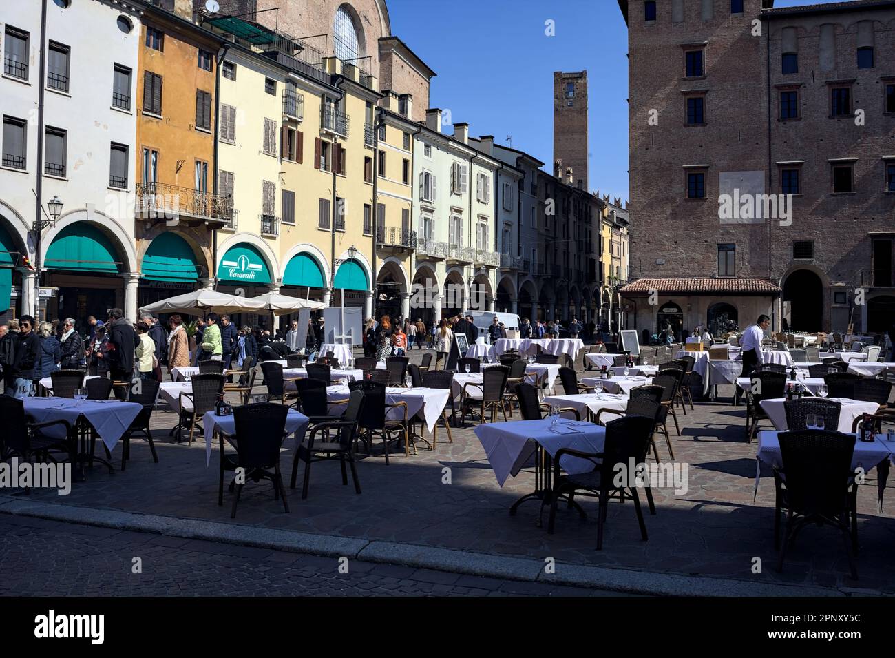 Square with people strolling in an italian town on a sunny day Stock ...