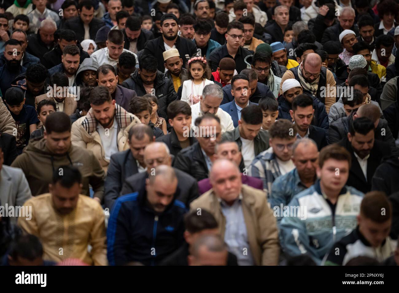 Hafsa Ahmed, 2 years-old, stands during Eid Al-Fitr prayers in ...