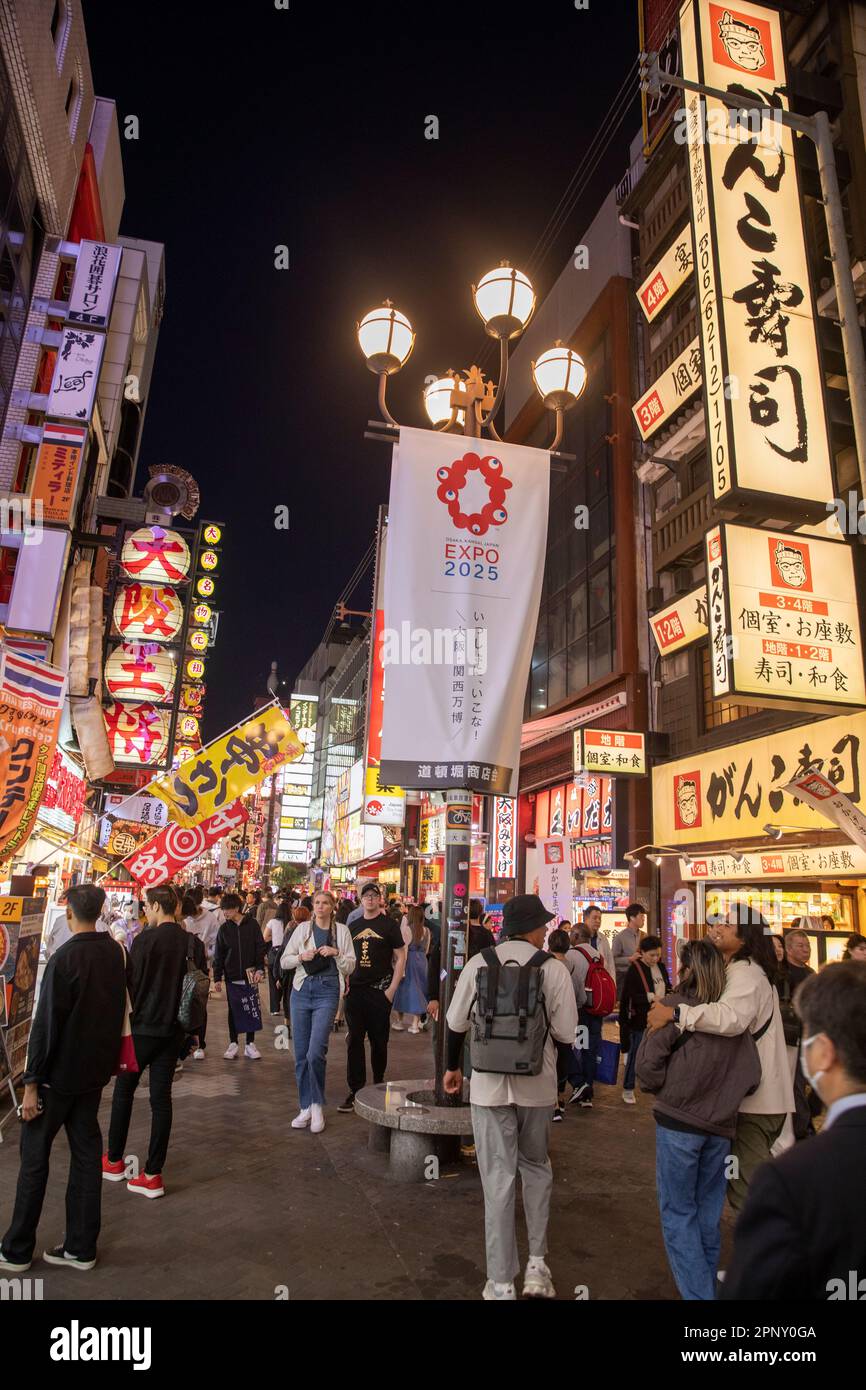 Osaka Japan April 2023, crowds in the streets of Osaka at night ...