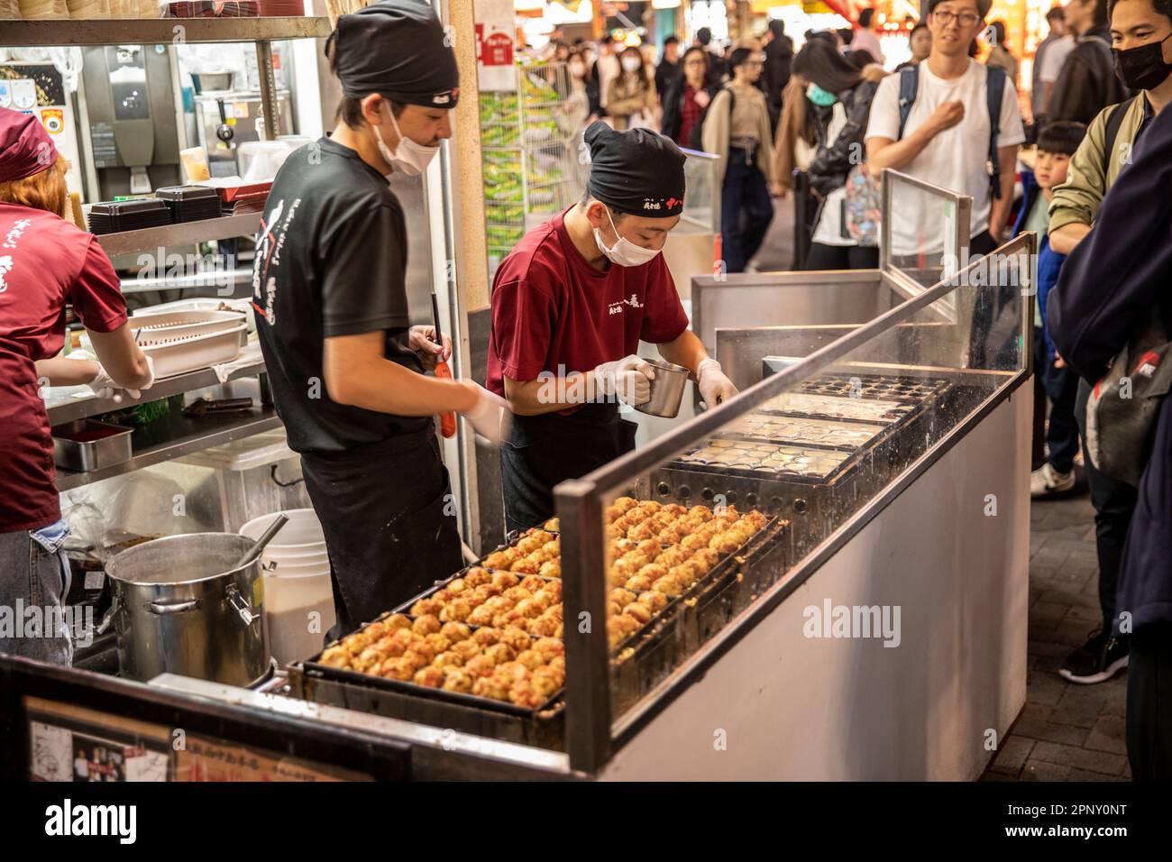 Osaka Japan April 2023 Japanese chefs prepare takoyaki octopus balls ...