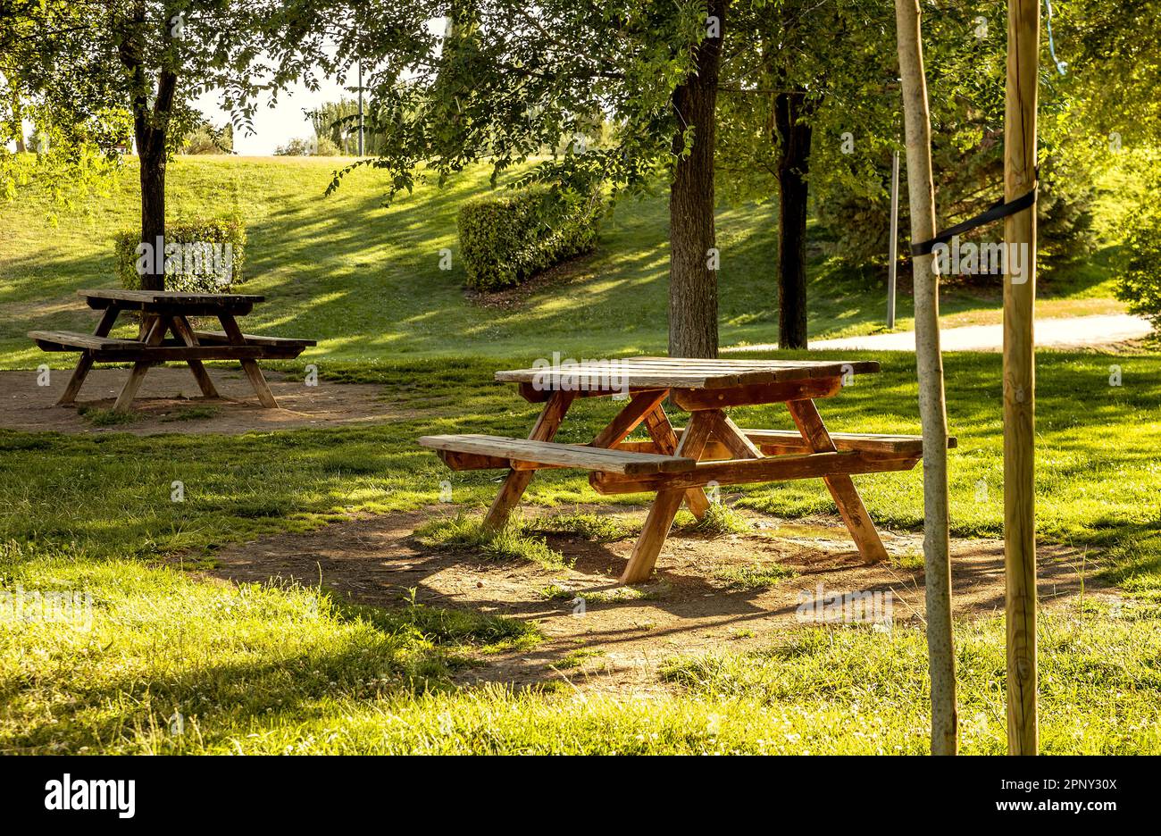 green landscape with picnic tables in the countryside Stock Photo - Alamy