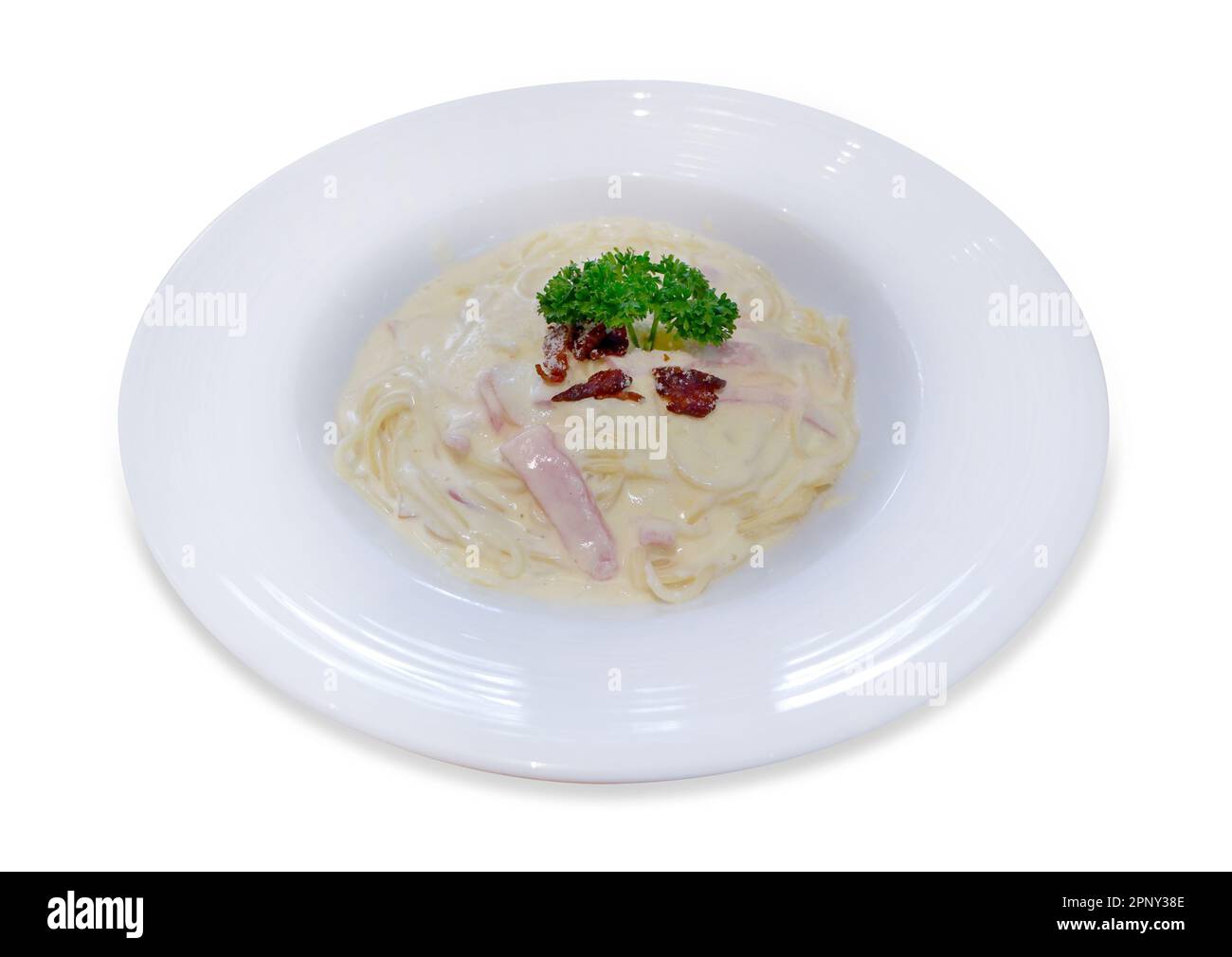 Die cut of Spaghetti carbonara with mushroom cream sauce and ham ...