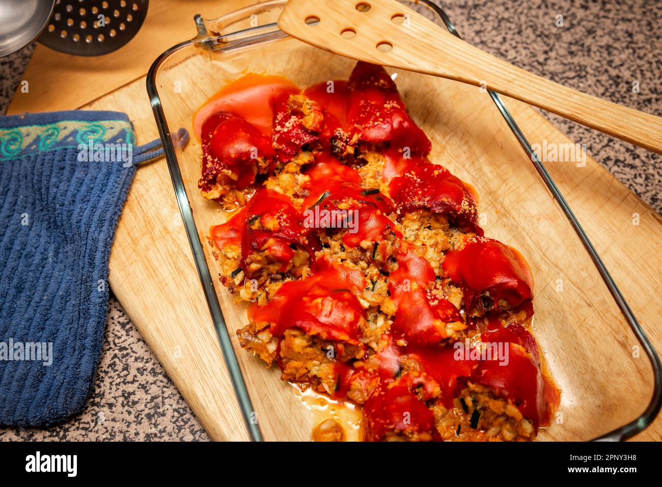 baked peppers stuffed with hake and onions Stock Photo - Alamy