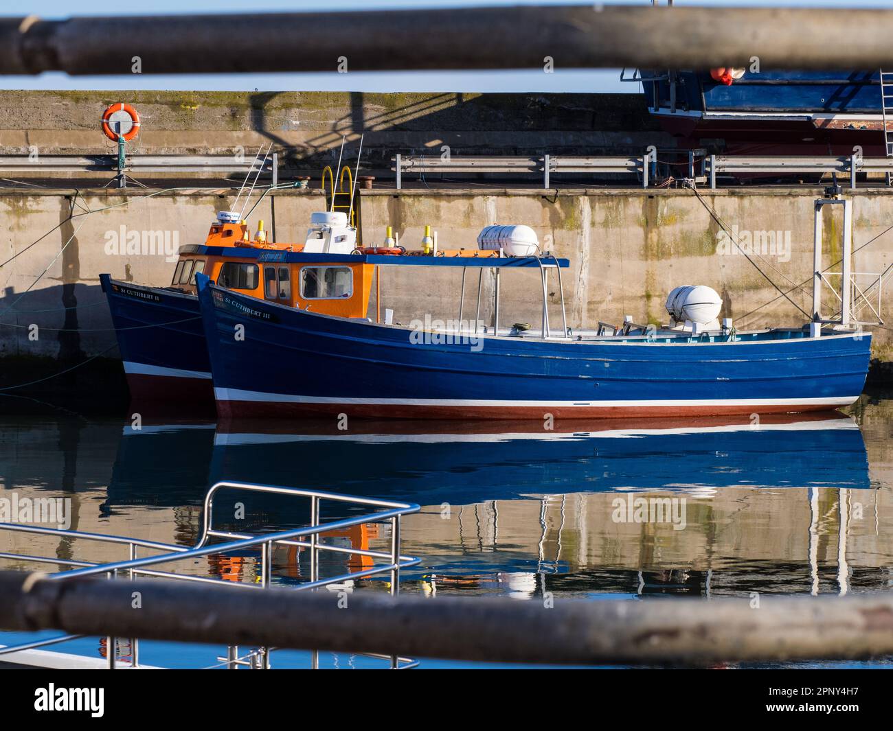 A boat in the harbour at Seahouses, Northumberland Stock Photo - Alamy