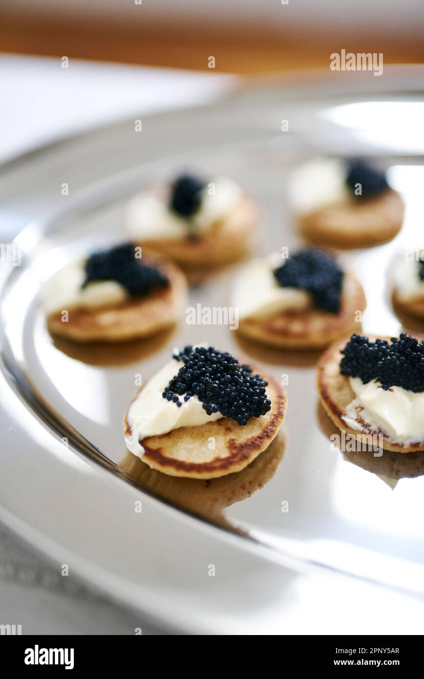 Delicious looking caviar and cream cheese platter on silver tray Stock ...