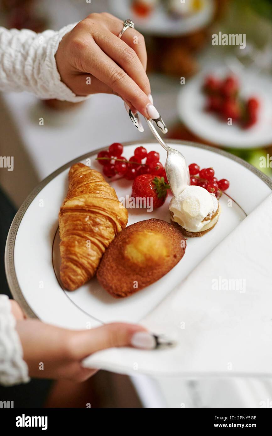 Girl with alternative nails enjoying classy french breakfast Stock ...