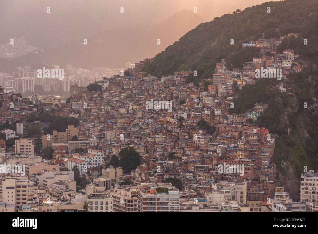 Beautiful aerial view to city buildings and favela slum in hill side ...