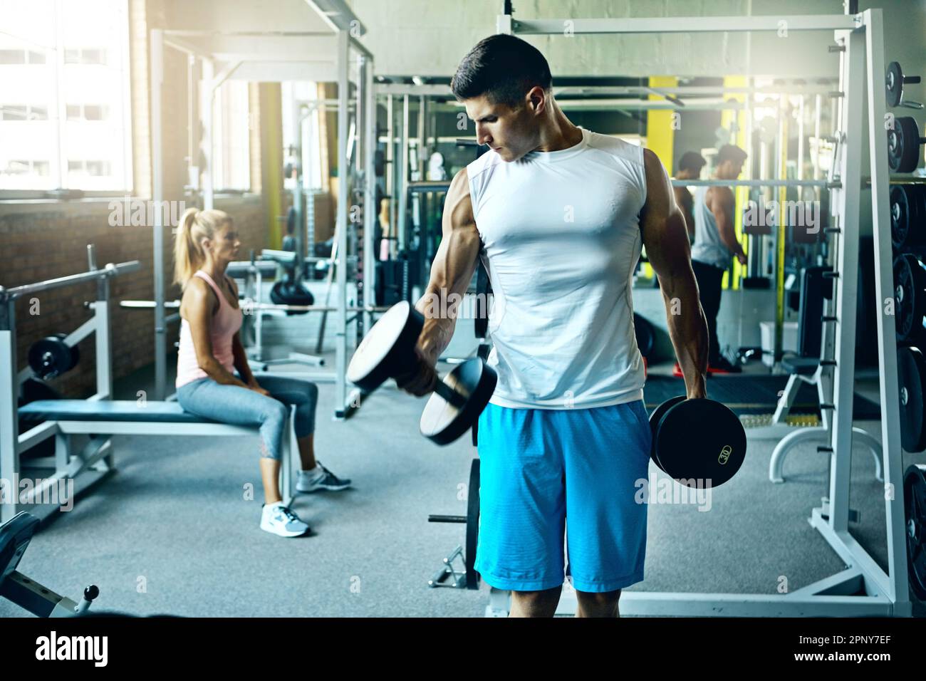 Sore or sorry, its your choice. a young man working out alone in the ...