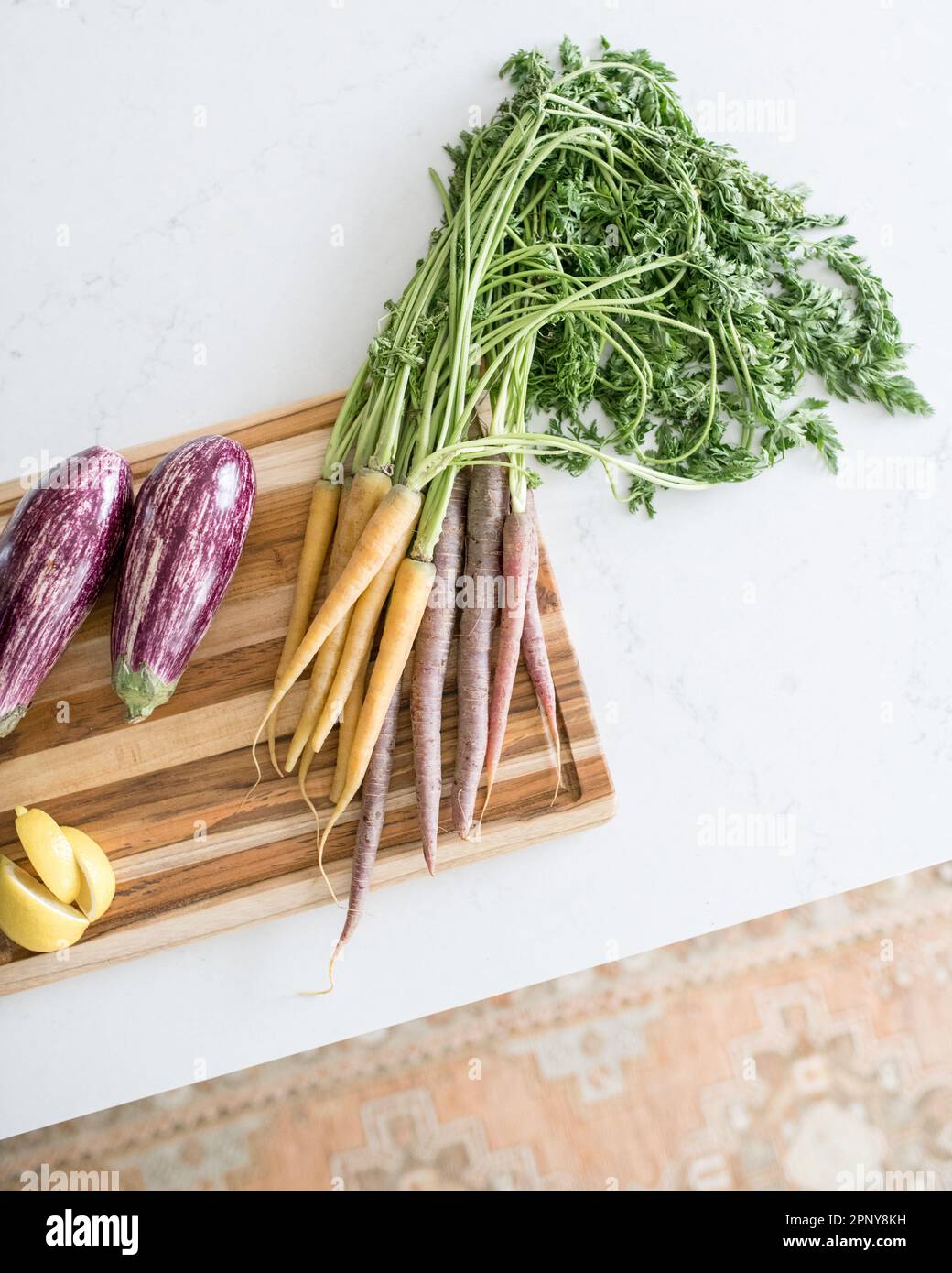 Garden Vegetables on Marble Counter Top Stock Photo - Alamy