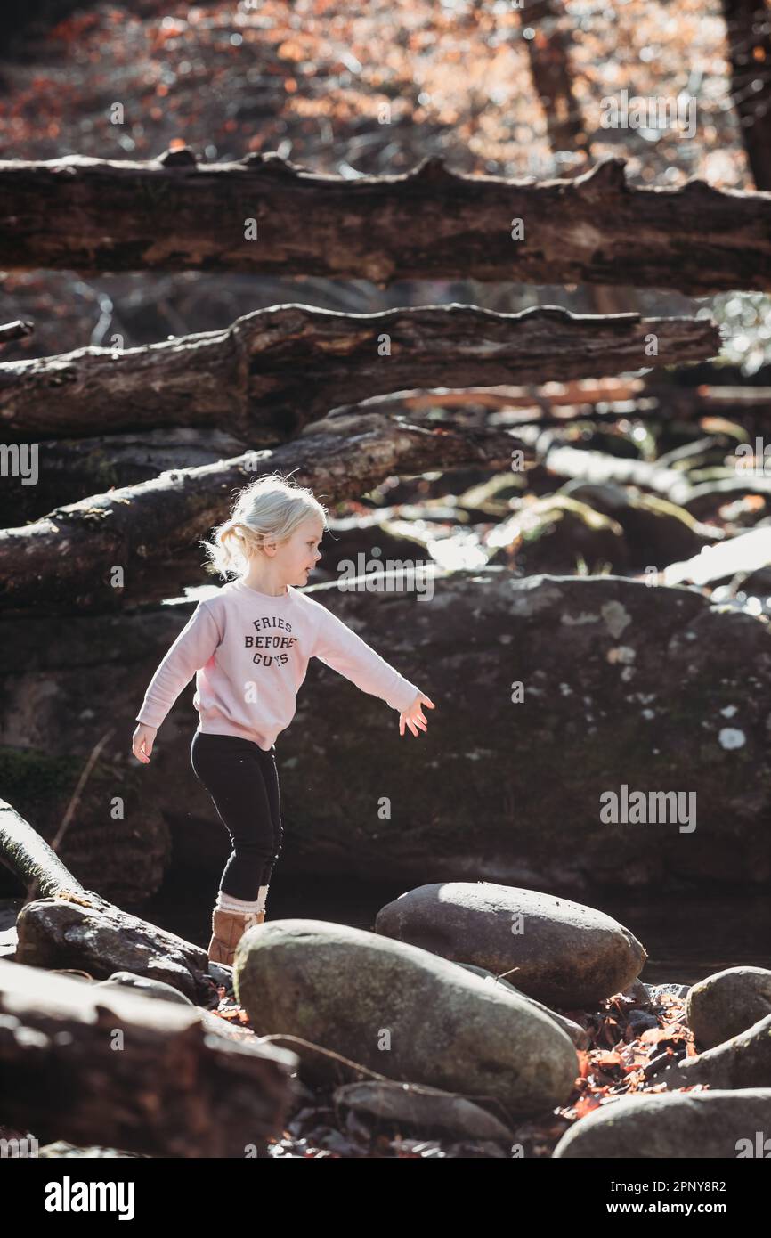 Kids playing on the rocks hi-res stock photography and images - Alamy