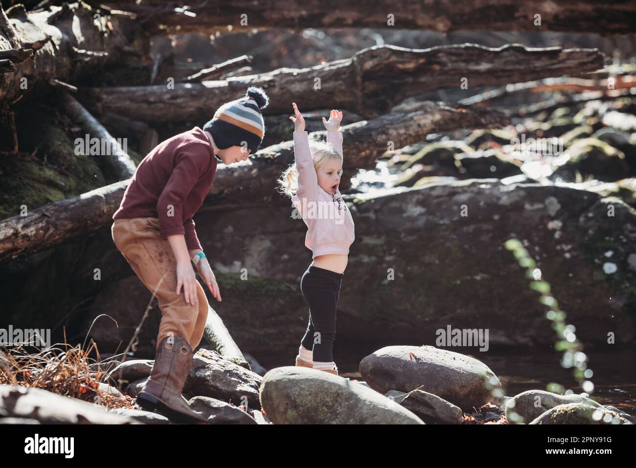 Kids playing in beautiful outdoor natural area Stock Photo - Alamy
