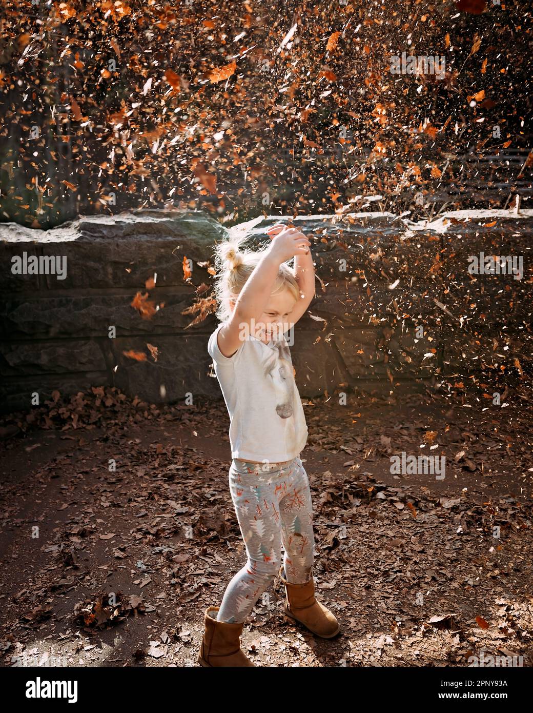 Child falling leaves hi-res stock photography and images - Alamy