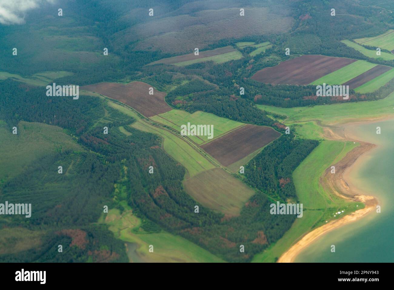 Aerial view of fields on the coast in greece Stock Photo - Alamy