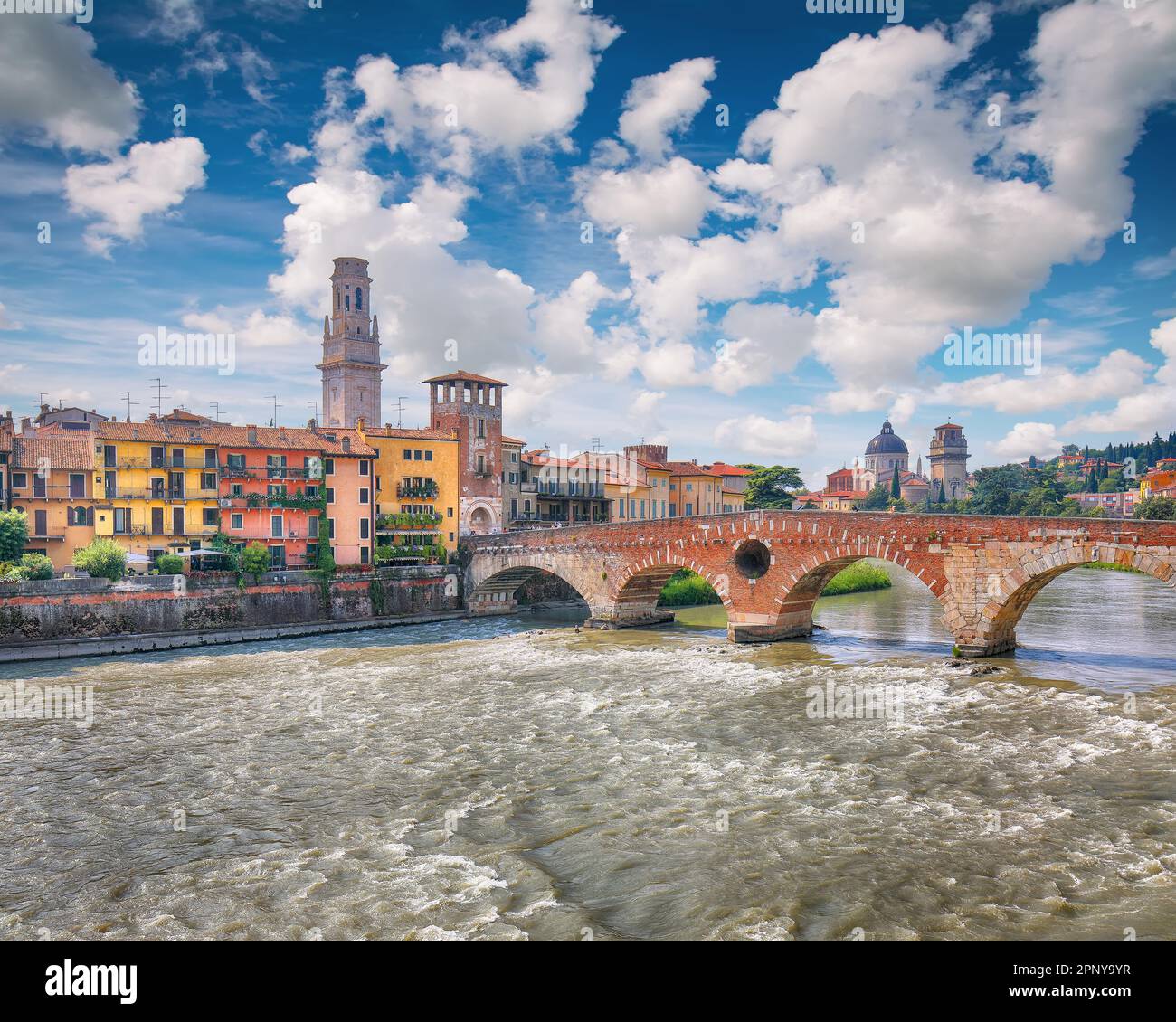 Amazing Verona cityscape view on the riverside with historical buildings ,bridges and towers ...