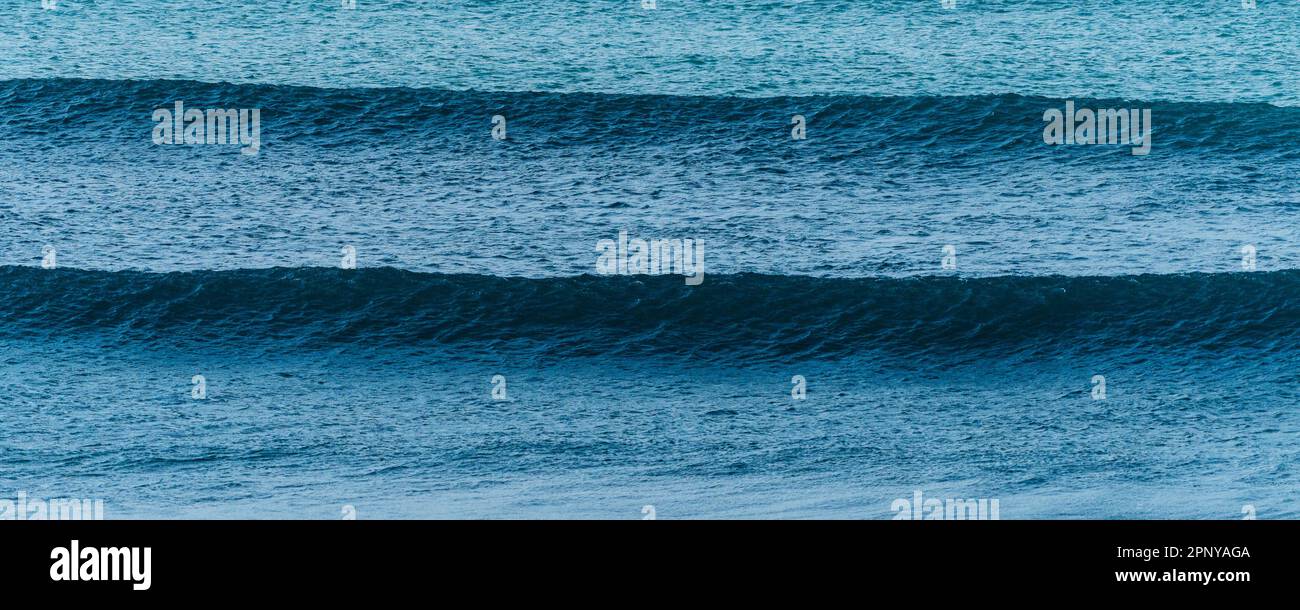 A panoramic view of incoming waves in Fistral Bay in Newquay in ...