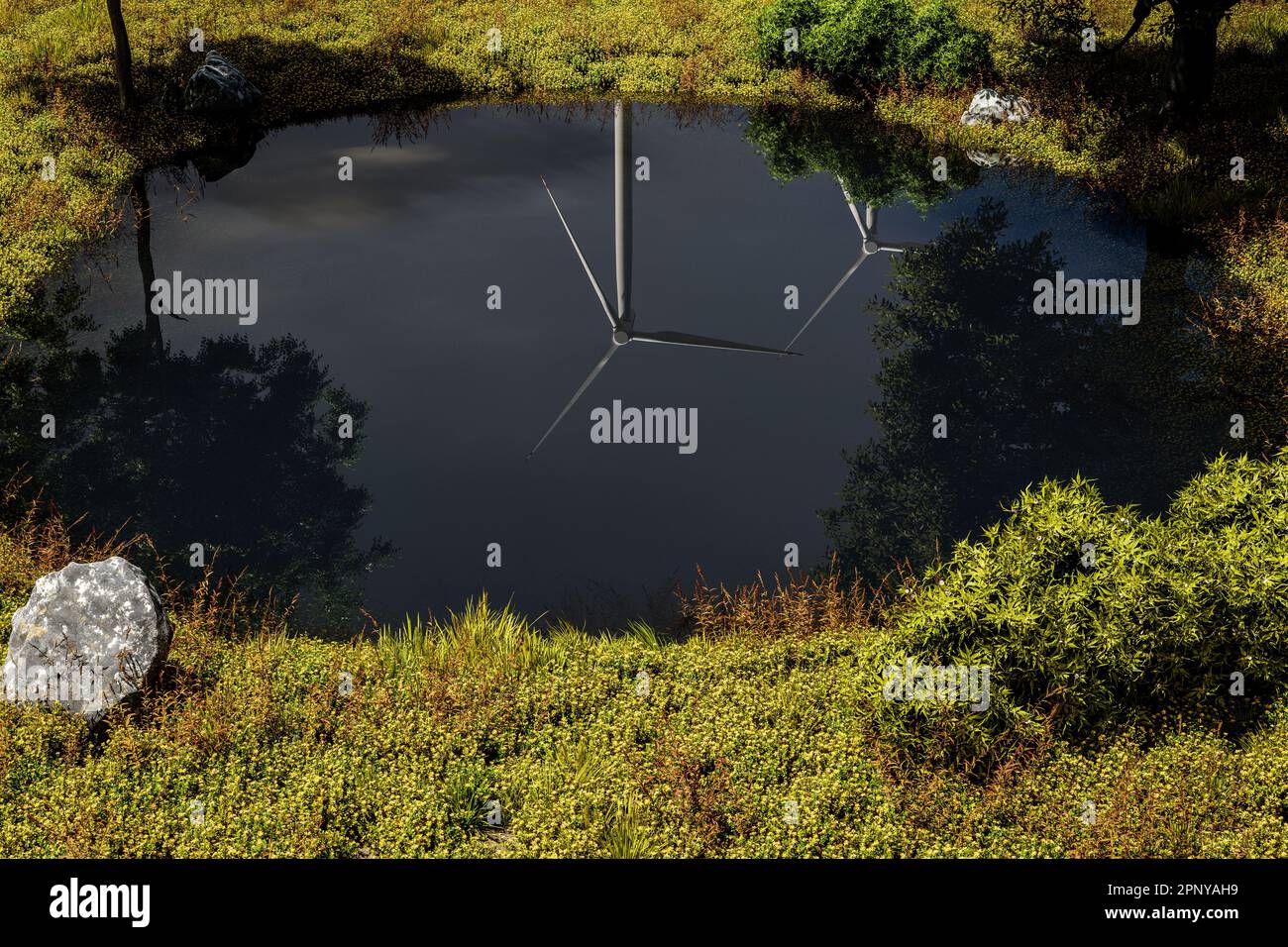 wind turbines are reflected in a small pond surrounded by grass and ...