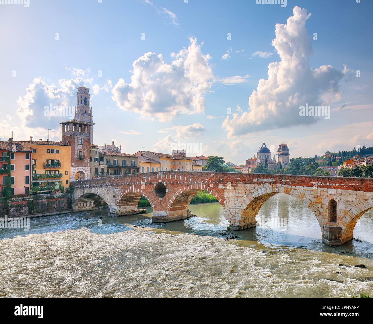 Astonishing Verona cityscape view on the riverside with historical buildings ,bridges and towers ...