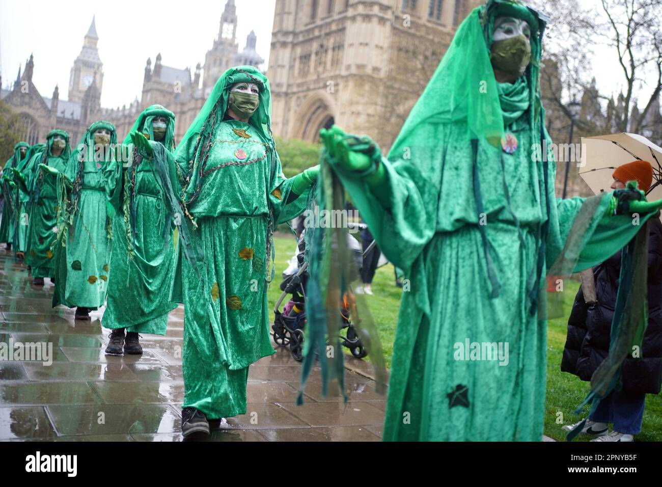 Extinction Rebellion demonstrators from the Green Brigade march in ...