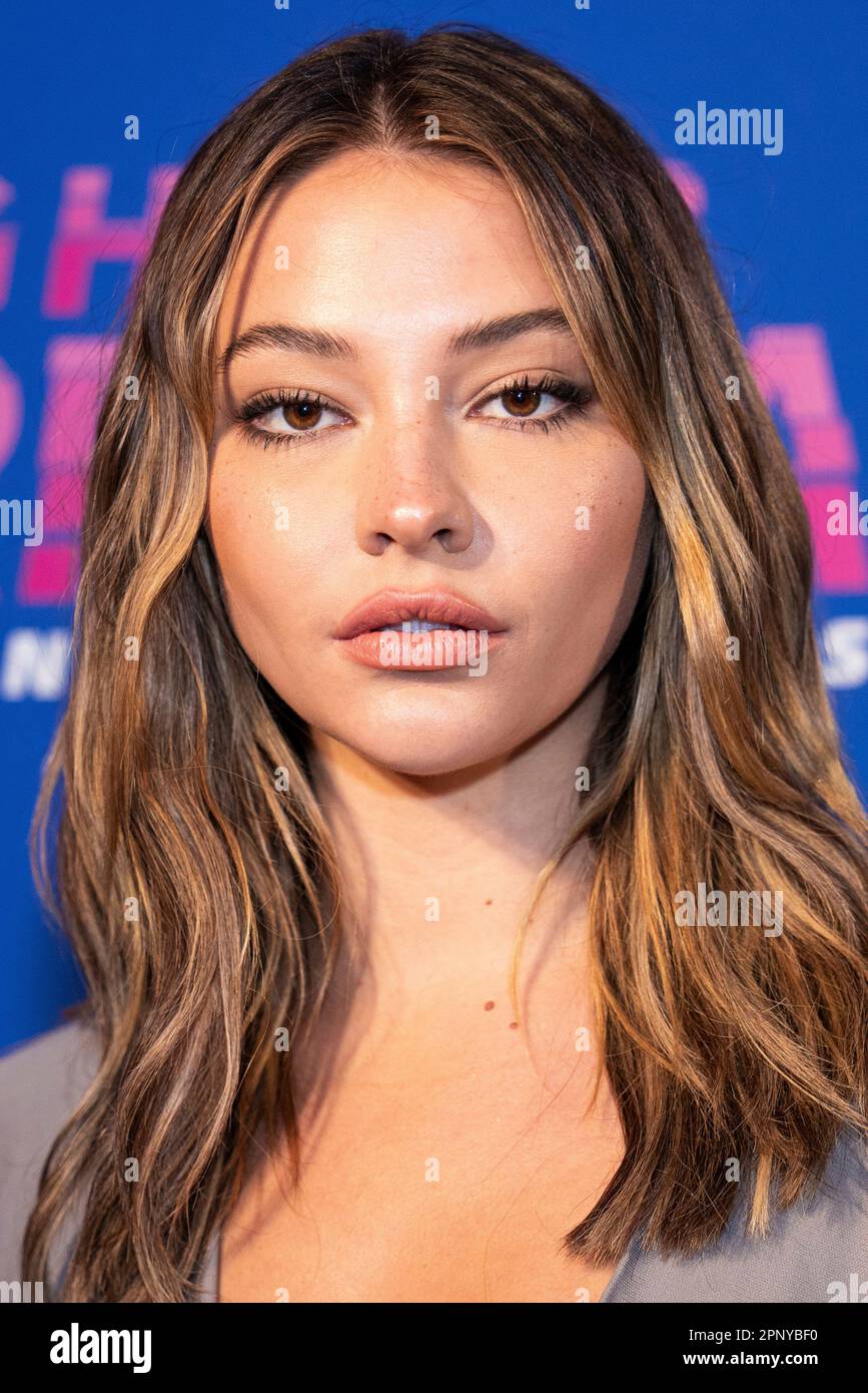 Madelyn Cline poses for photographers upon arrival at the TAG Heuer ...