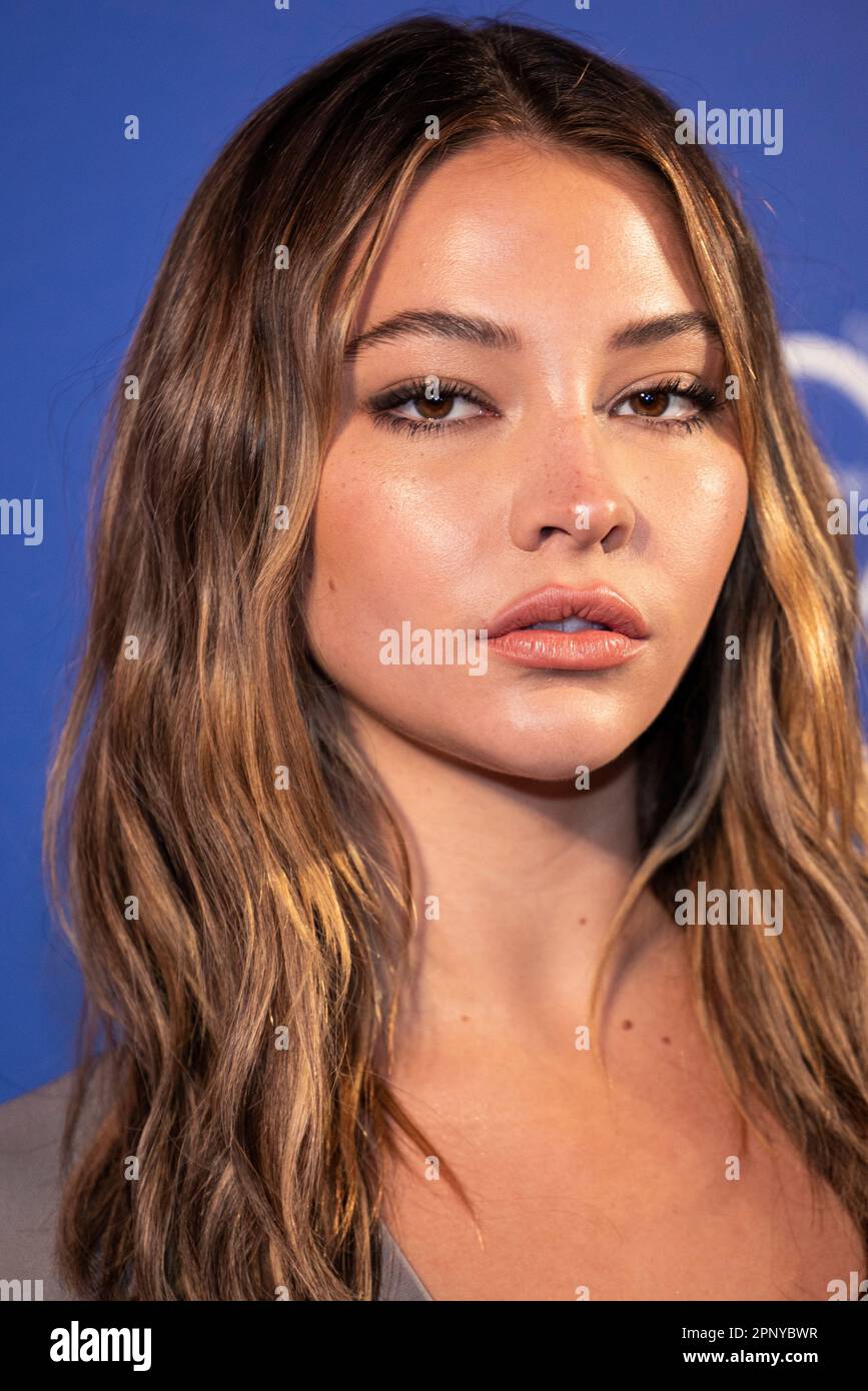 Madelyn Cline poses for photographers upon arrival at the TAG Heuer ...