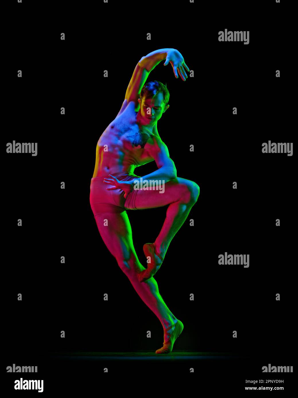 Portrait of young handsome, muscle men, ballet dancer in pastel color ...