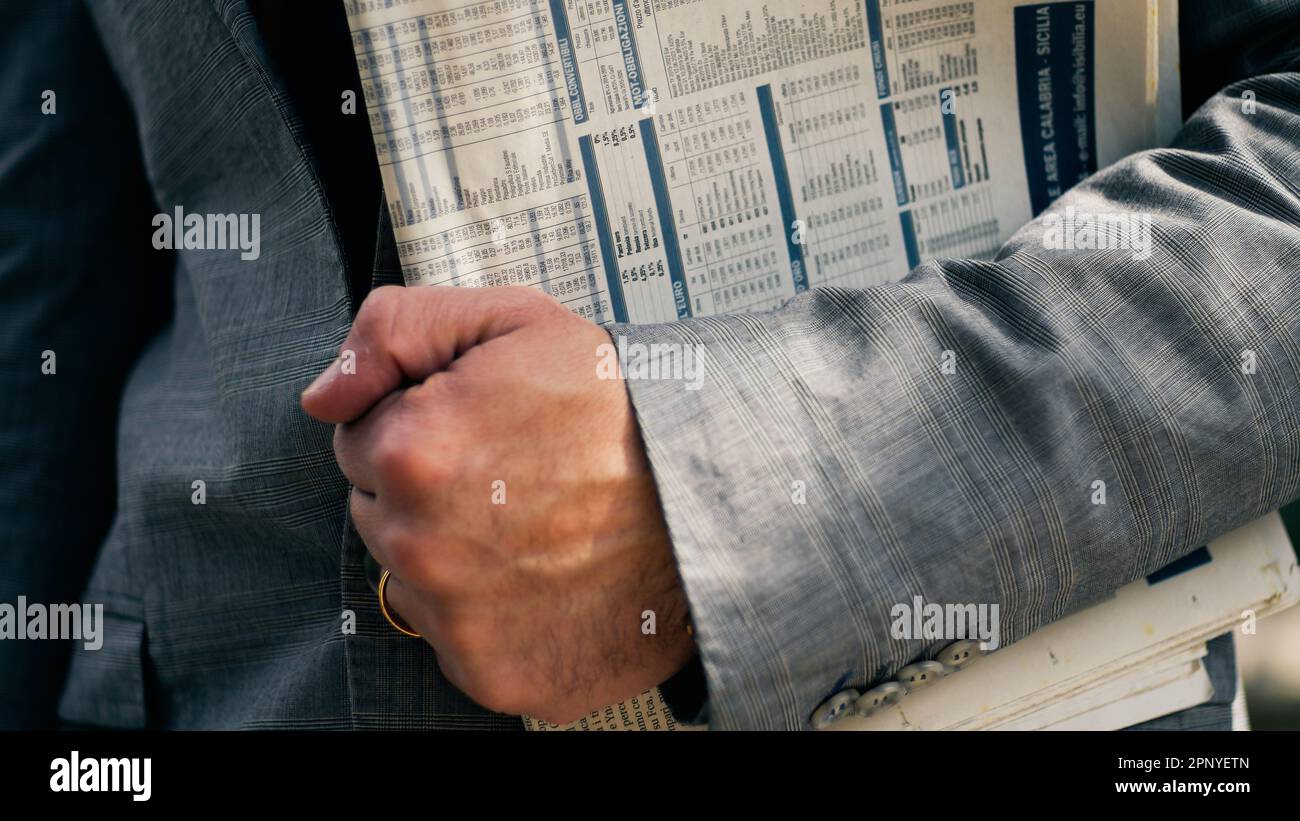 Man newspaper under arm hi-res stock photography and images - Alamy