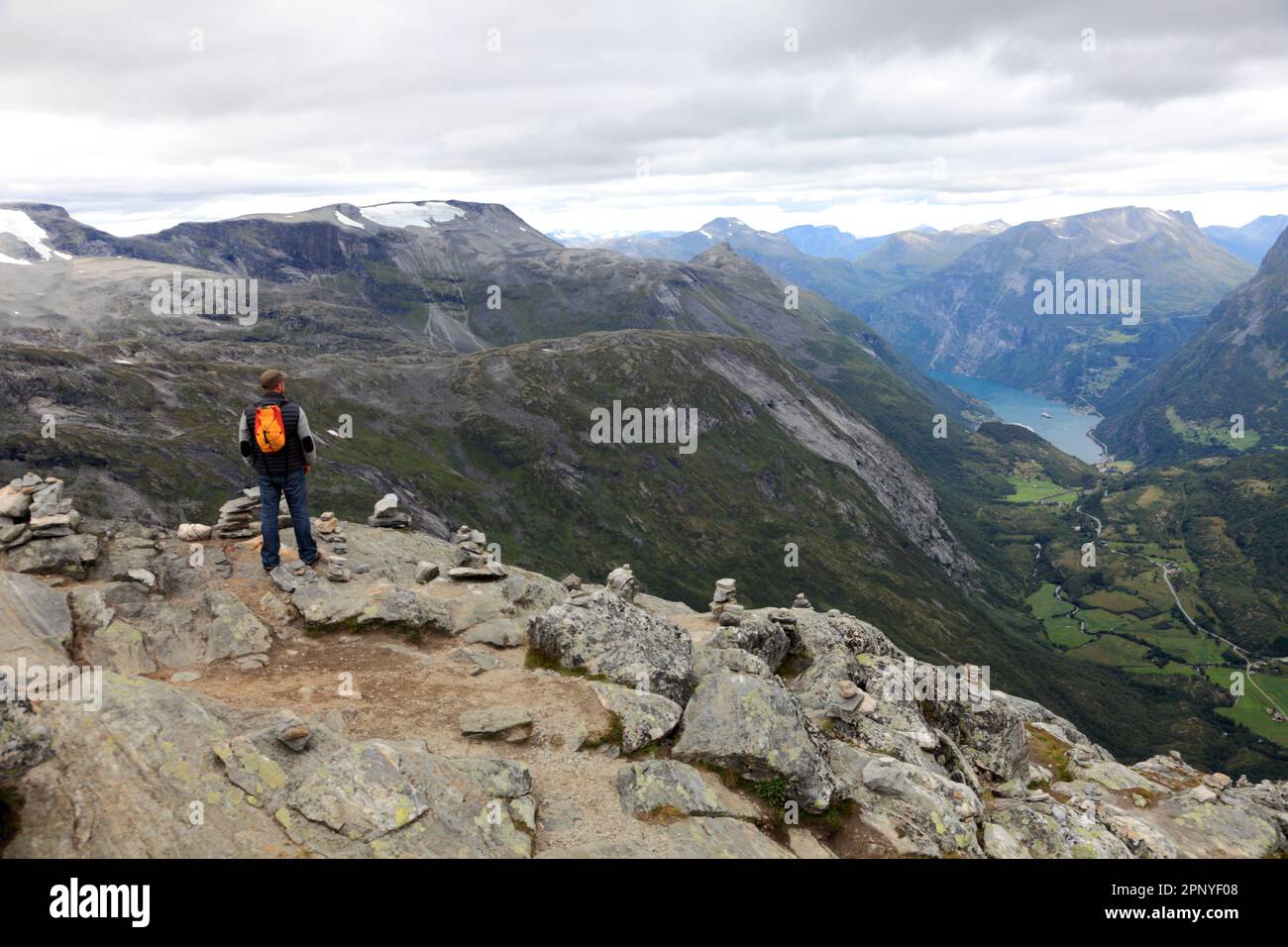Tourists at the Dalsnibba mountain viewpoint, Geirangerfjord, UNESCO ...