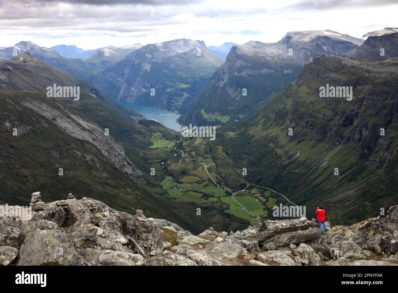 Tourists at the Dalsnibba mountain viewpoint, Geirangerfjord, UNESCO ...