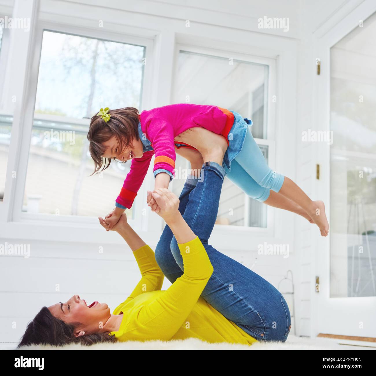 Mamas got you. an adorable little girl and her mother having fun at ...