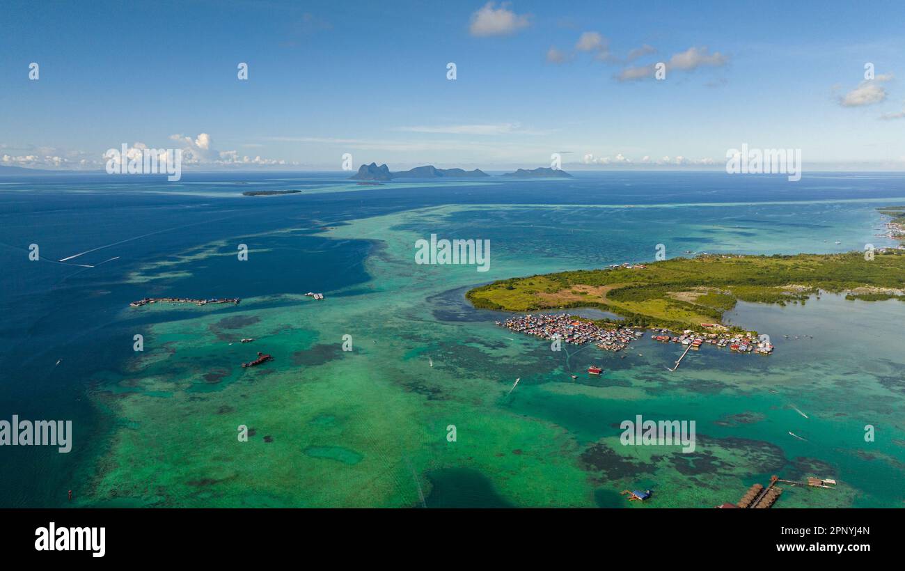 Aerial view of coast of the island Bum Bum with towns and villages. Tun ...