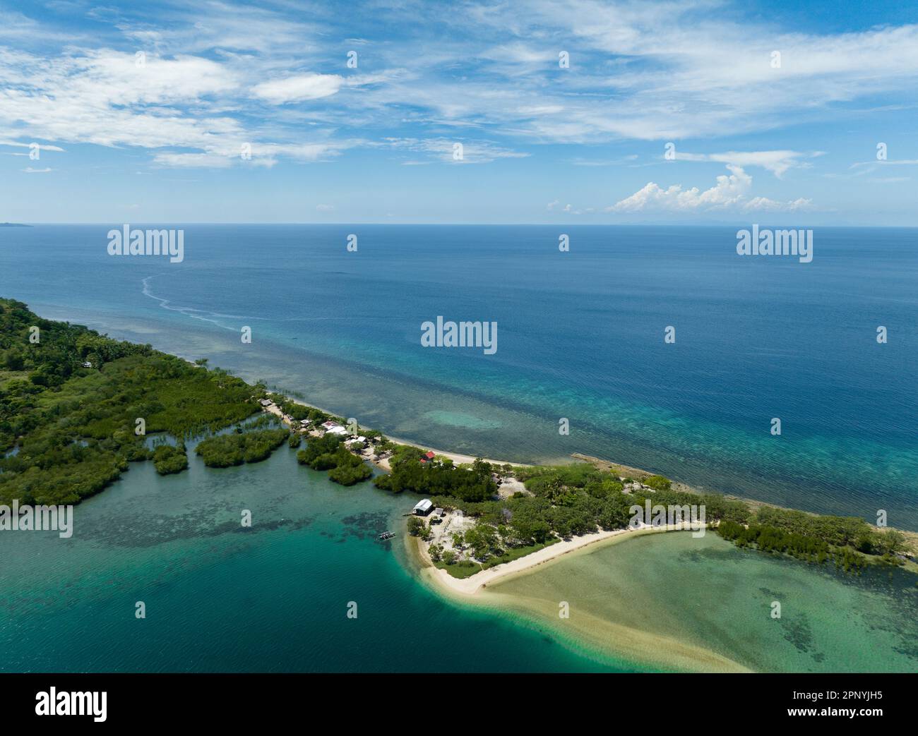 Top view of tropical island coastline and blue sea. Ocean and blue sky ...
