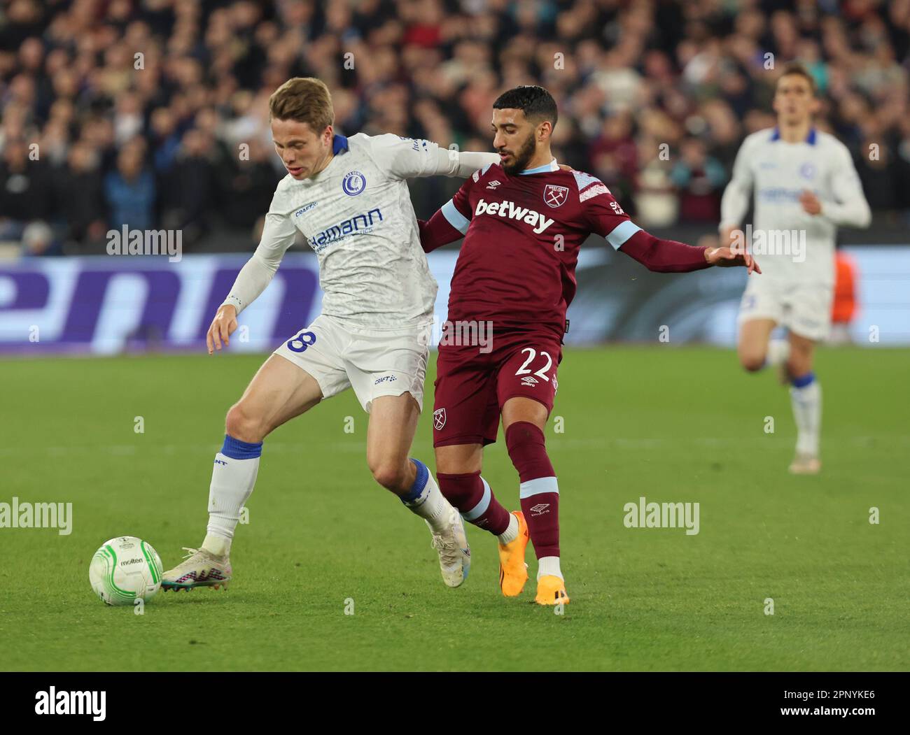 L-R Matisse Samoise of KAA Gent holds of West Ham United's Said ...