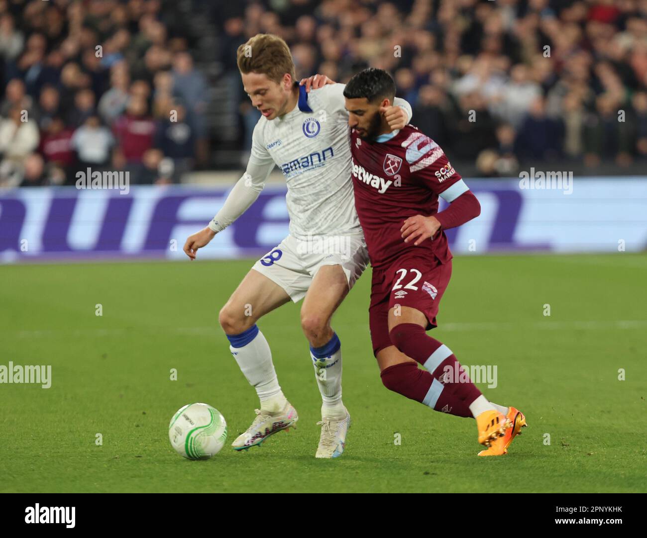 L-R Matisse Samoise of KAA Gent holds of West Ham United's Said ...