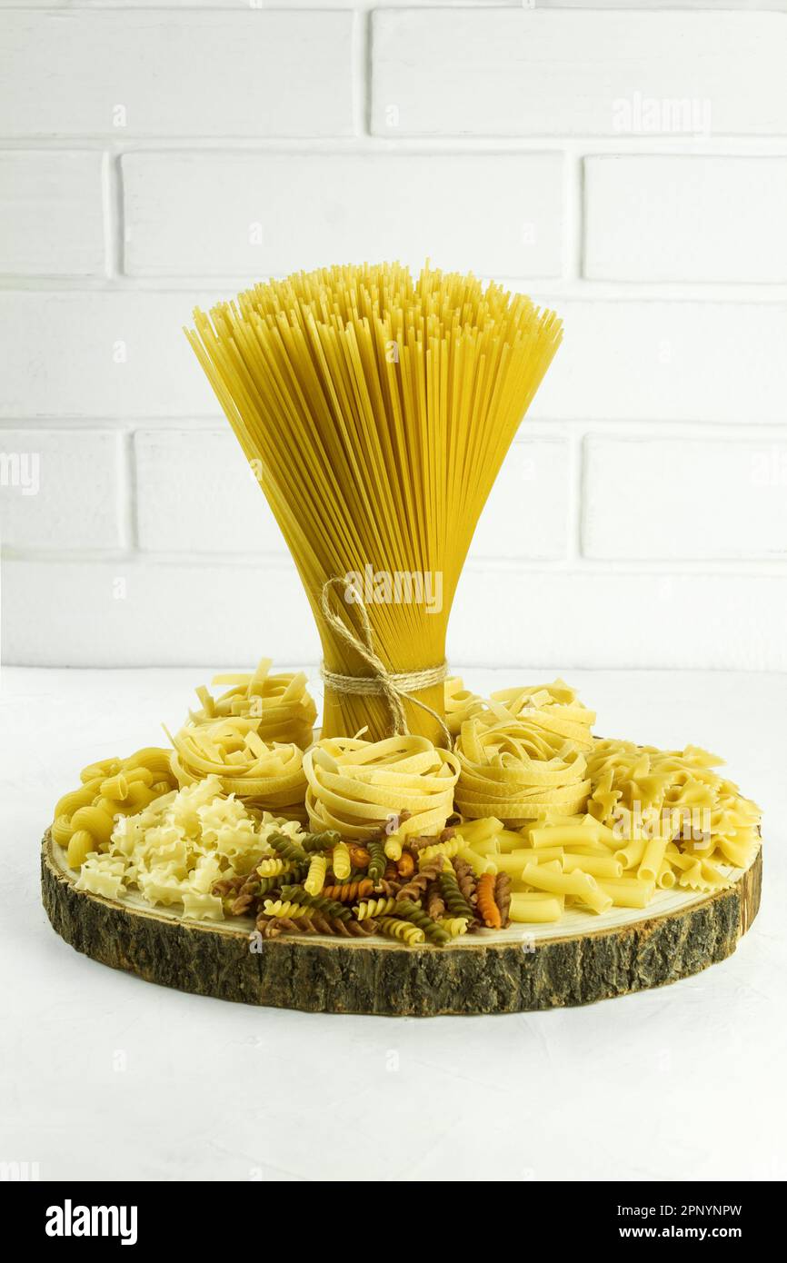 Spaghetti dry, A bunch of spaghetti tied with a rope. Pasta, high ...