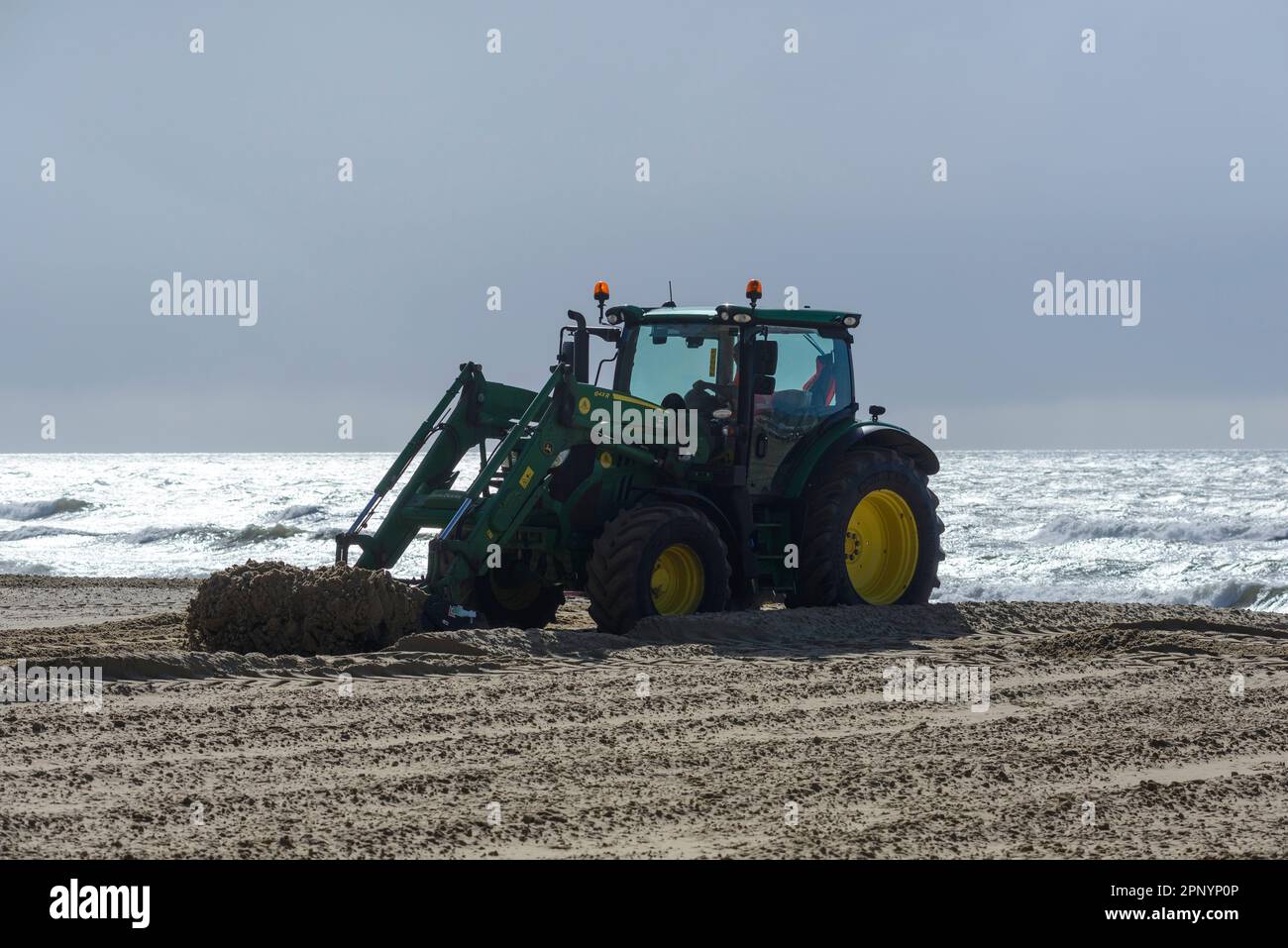 Raking sand hi-res stock photography and images - Alamy