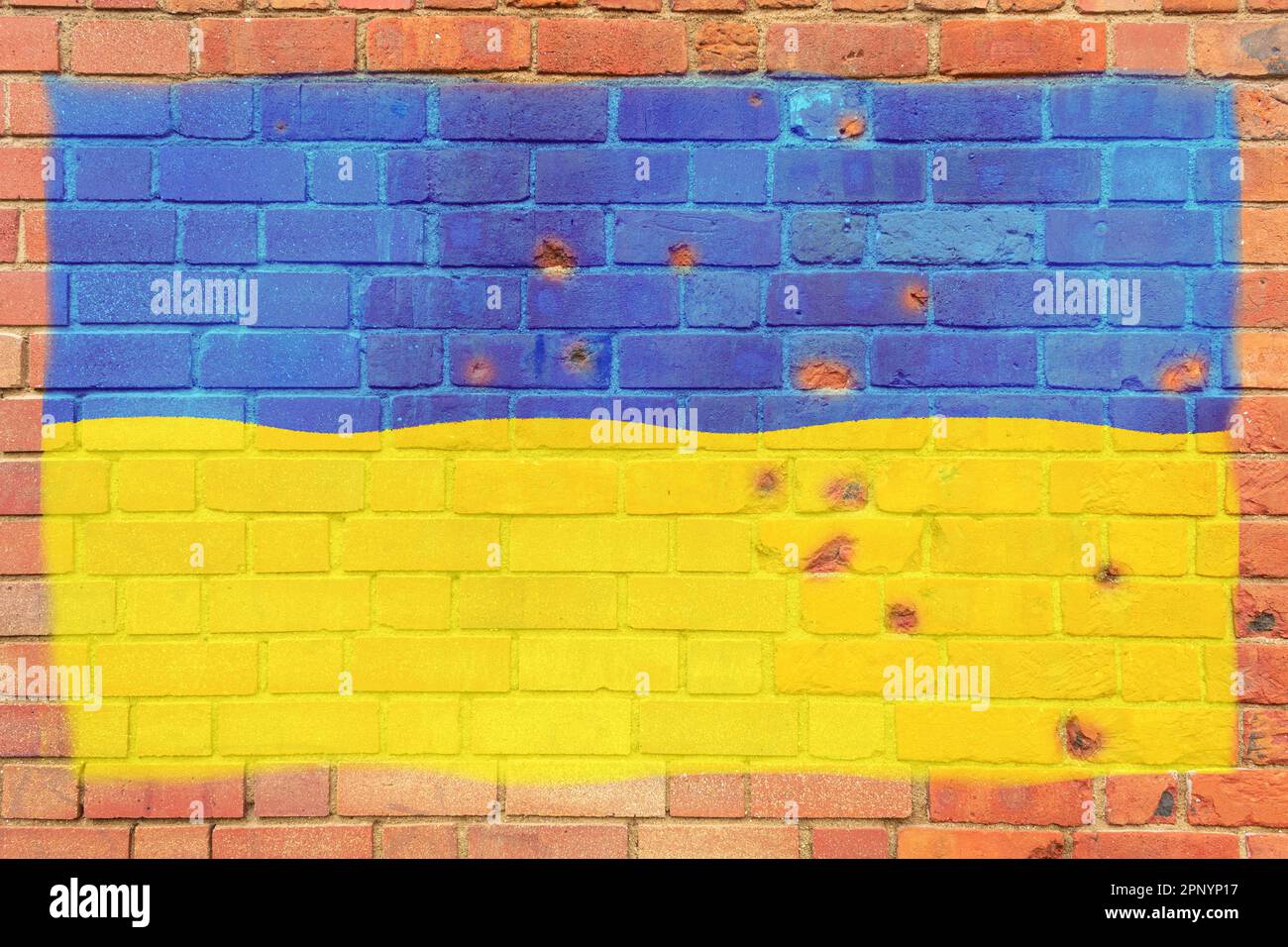The flag of Ukraine is painted on a brick wall. Flag on an old stone ...