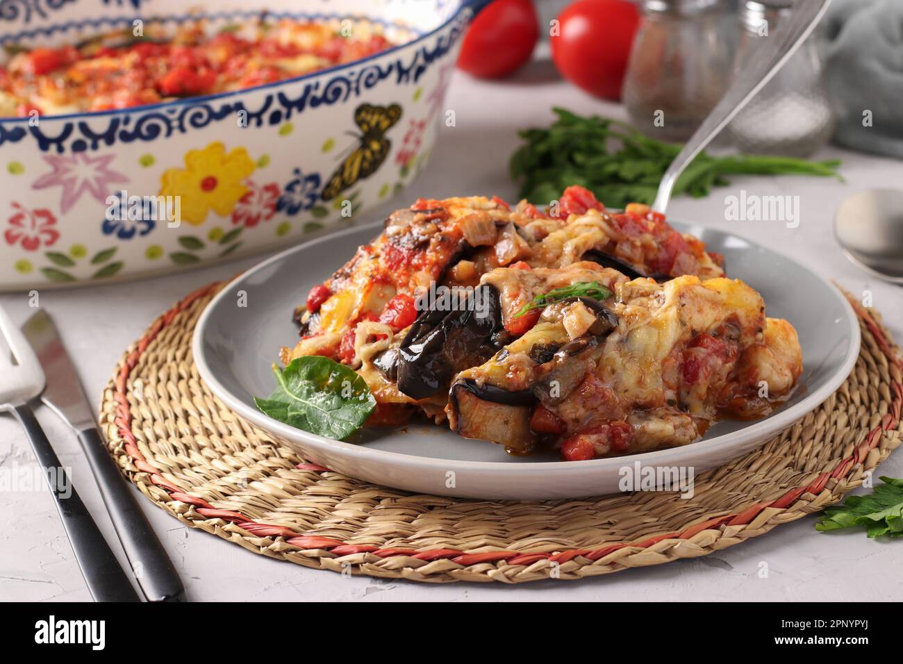 Traditional Italian dish Parmigiana is an appetizer made from baked ...