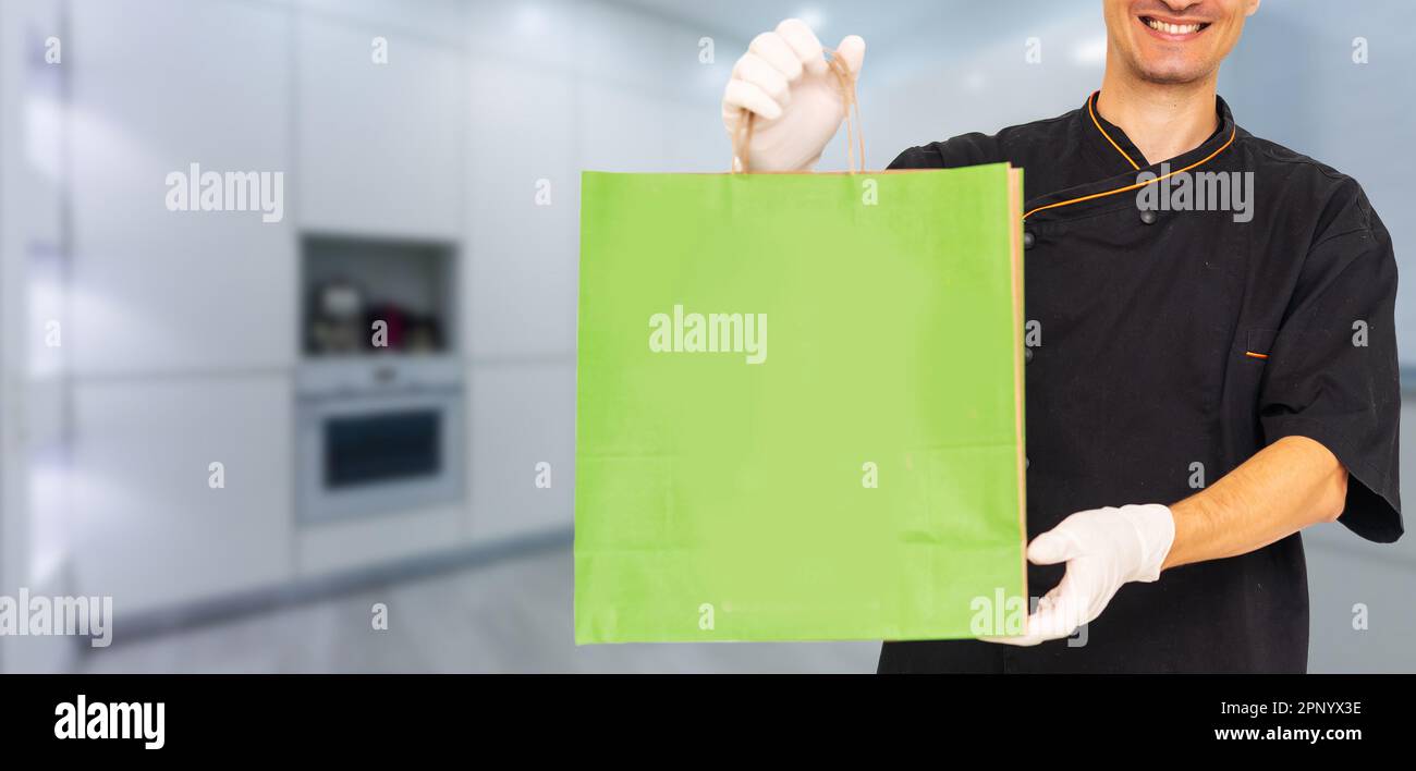 Courier holding paper bags with food, space for text. Delivery service ...
